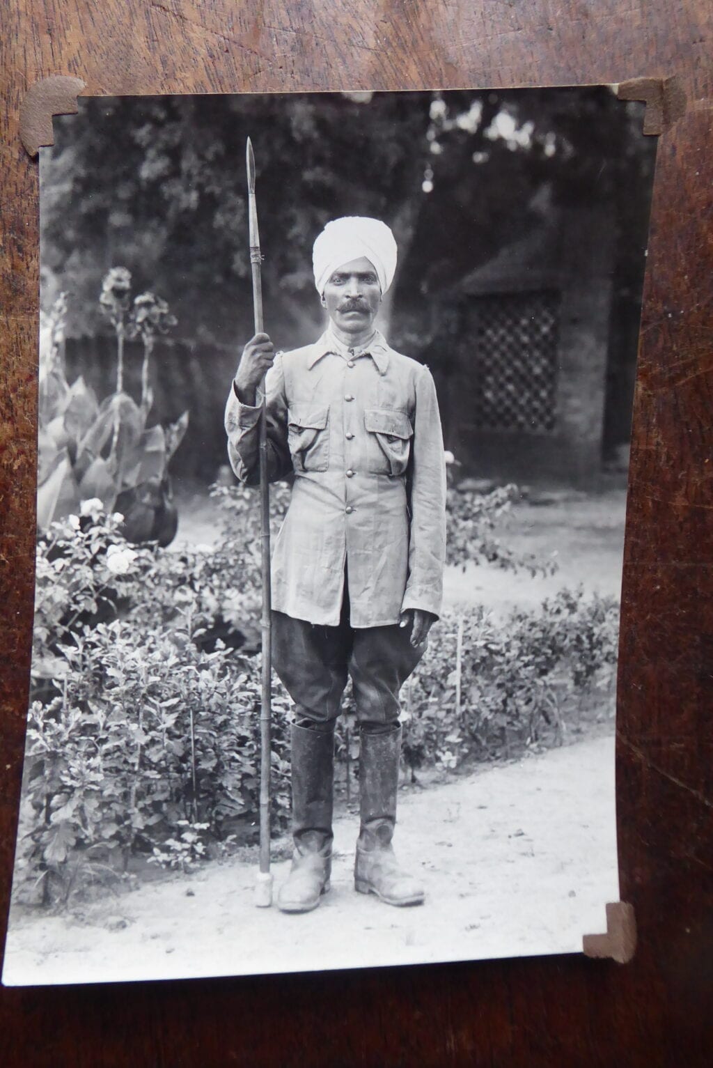 An Indian watchman or guard holding a spear – Bates and Hindmarch